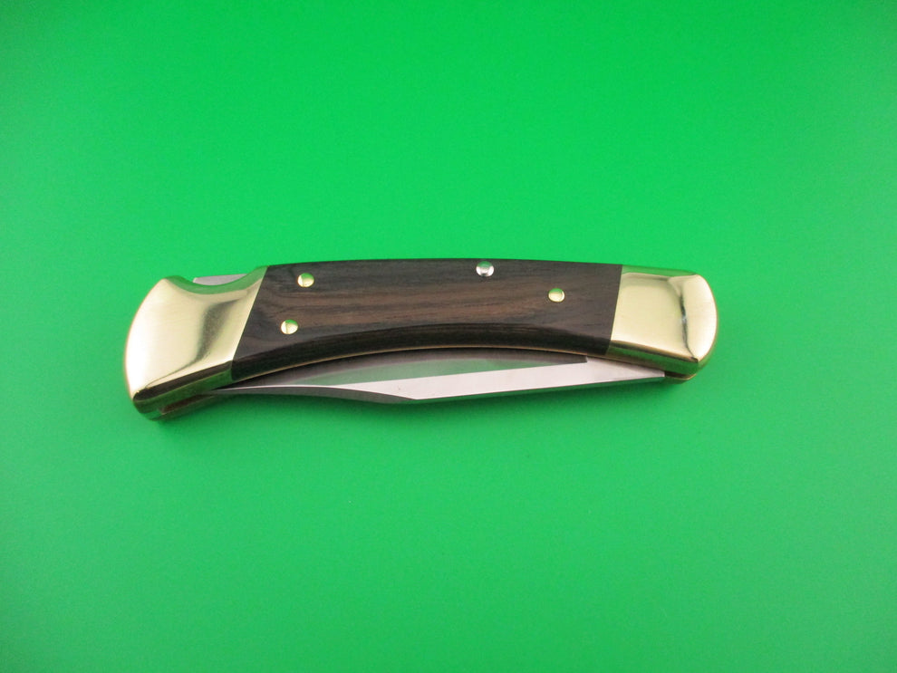 z BUCK 110 Automatic New in Box with Leather Sheath Hardwood scales – Apple Valley Knives